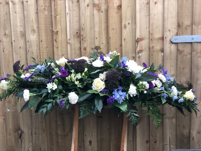 Purple & White Casket Spray – buy online or call 0161 483 3923
